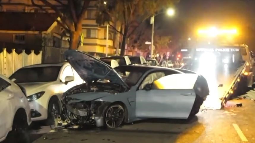 Watch: BMW M4 sent skyward after crashing through roundabout - Driven ...