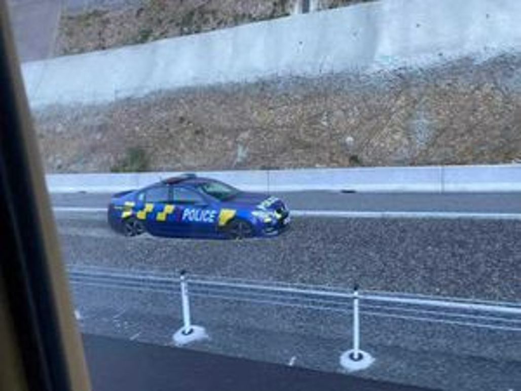 Police car stuck in gravel on Transmission Gully shoulder, n - Driven ...