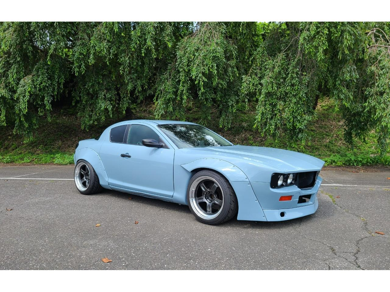 Mazda RX-8 gets a reverse restomod with a '70s RX-3 facelift - Driven ...