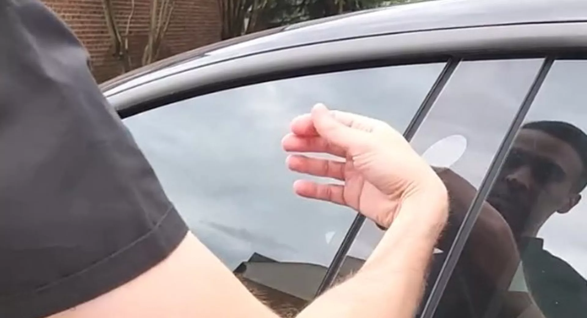 Tesla owner implants key chip into hand - Driven Car Guide