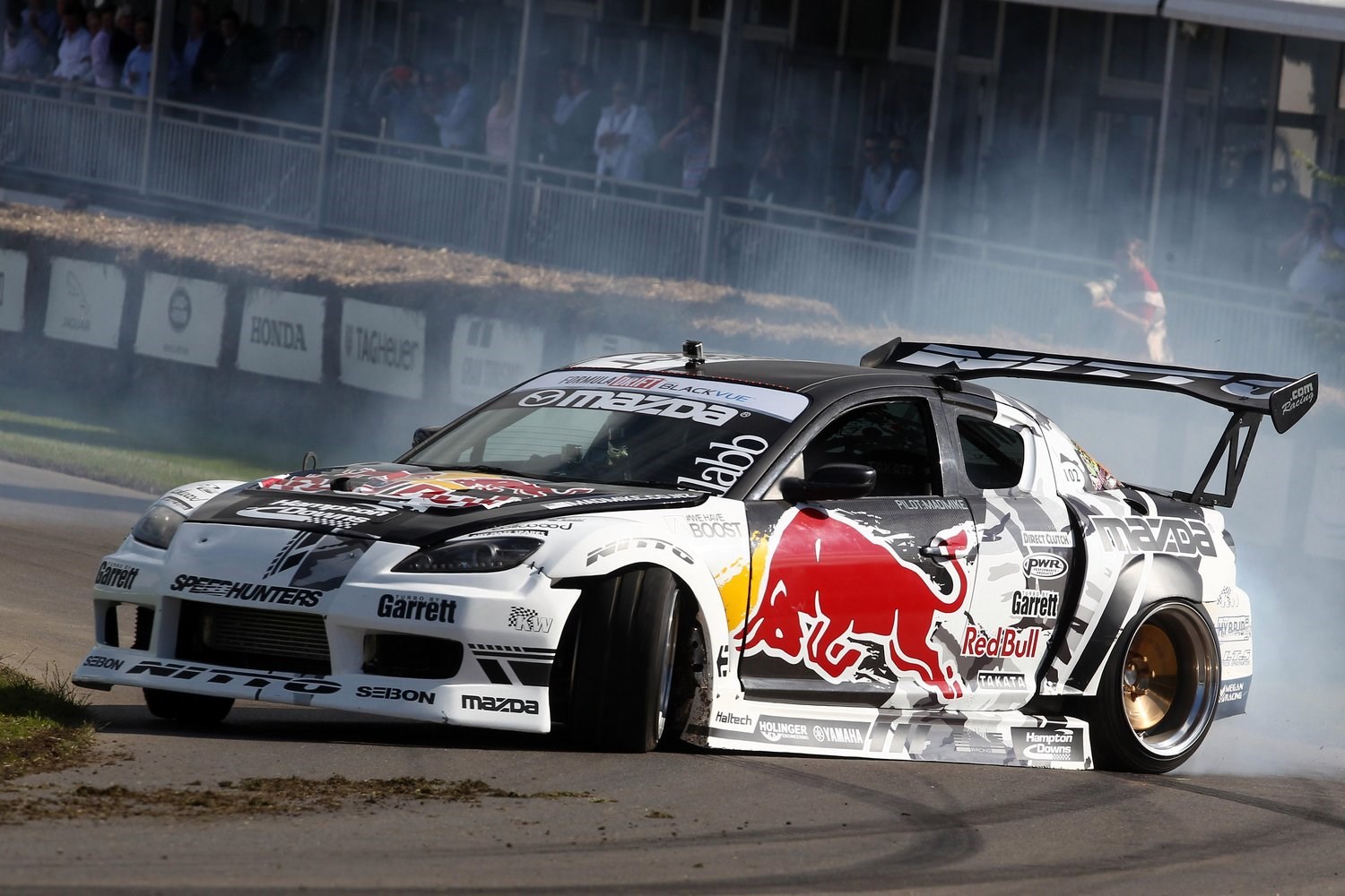 Watch 'Mad Mike' Whiddett attack Goodwood - Driven Car Guide