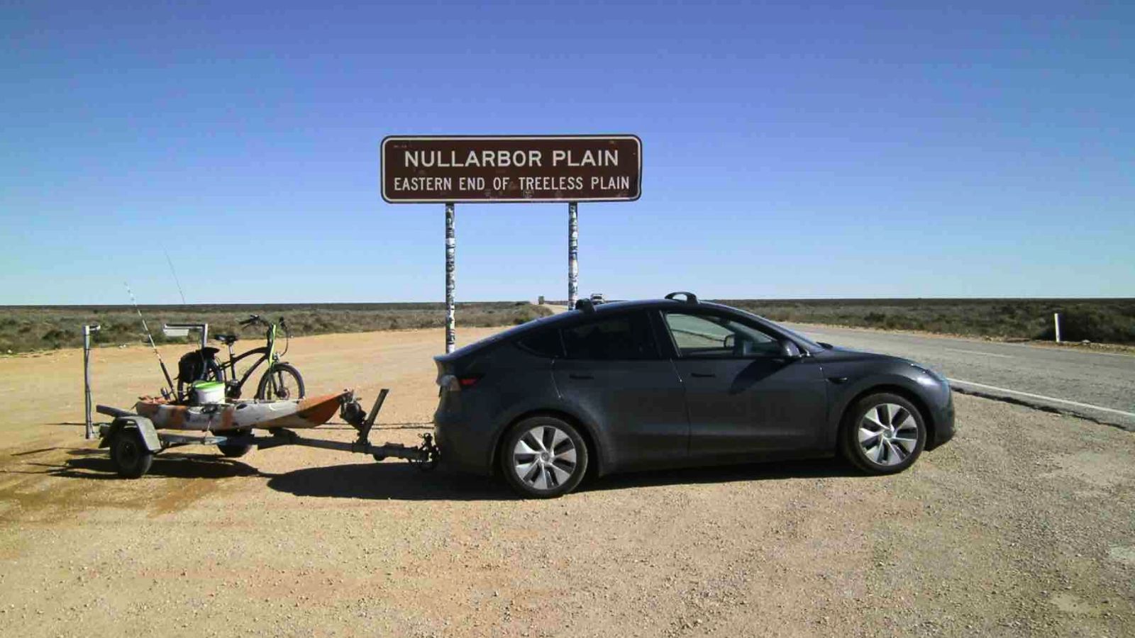 Tesla Model Y laps Australia while towing boat trailer - Driven Car Guide