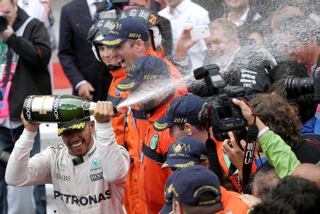 Jubilant Hamilton celebrates after rain-soaked Monaco GP win - Driven ...