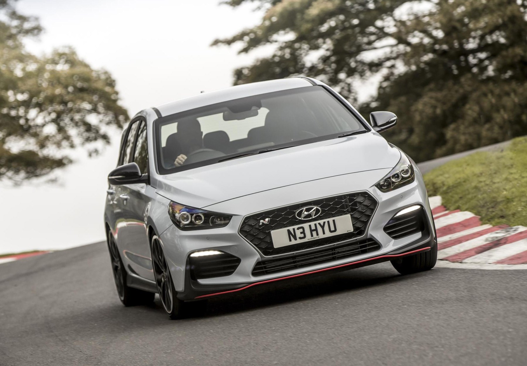 Watch hot hatch warriors face off: VW Golf GTI vs Hyundai i3 - Driven ...