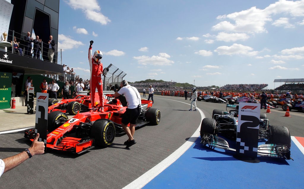 Sebastian Vettel claims win after dramatic British Grand Pri - Driven ...