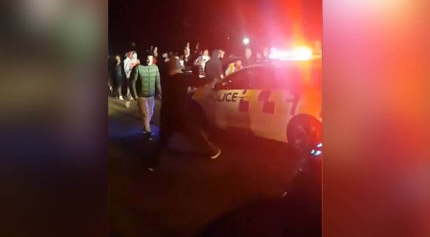 Watch: Boy racers box in, smash police car in street mayhem - Driven ...