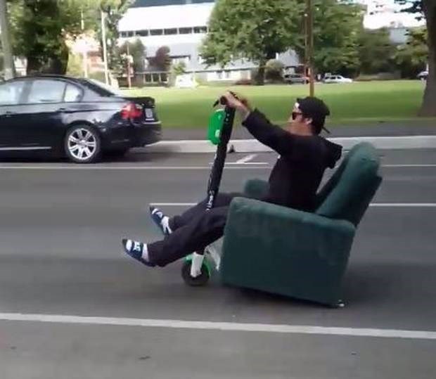 Watch: Dunedin man rides a Lime Scooter on a La-Z-Boy - Driven Car Guide