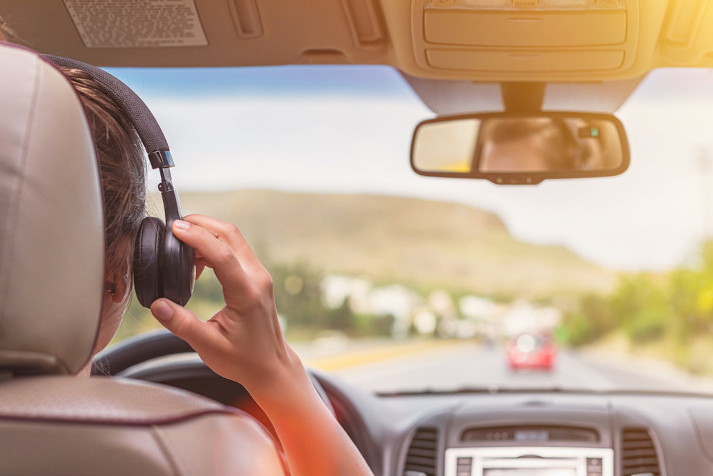 Is it legal to wear headphones while driving? - Driven Car Guide